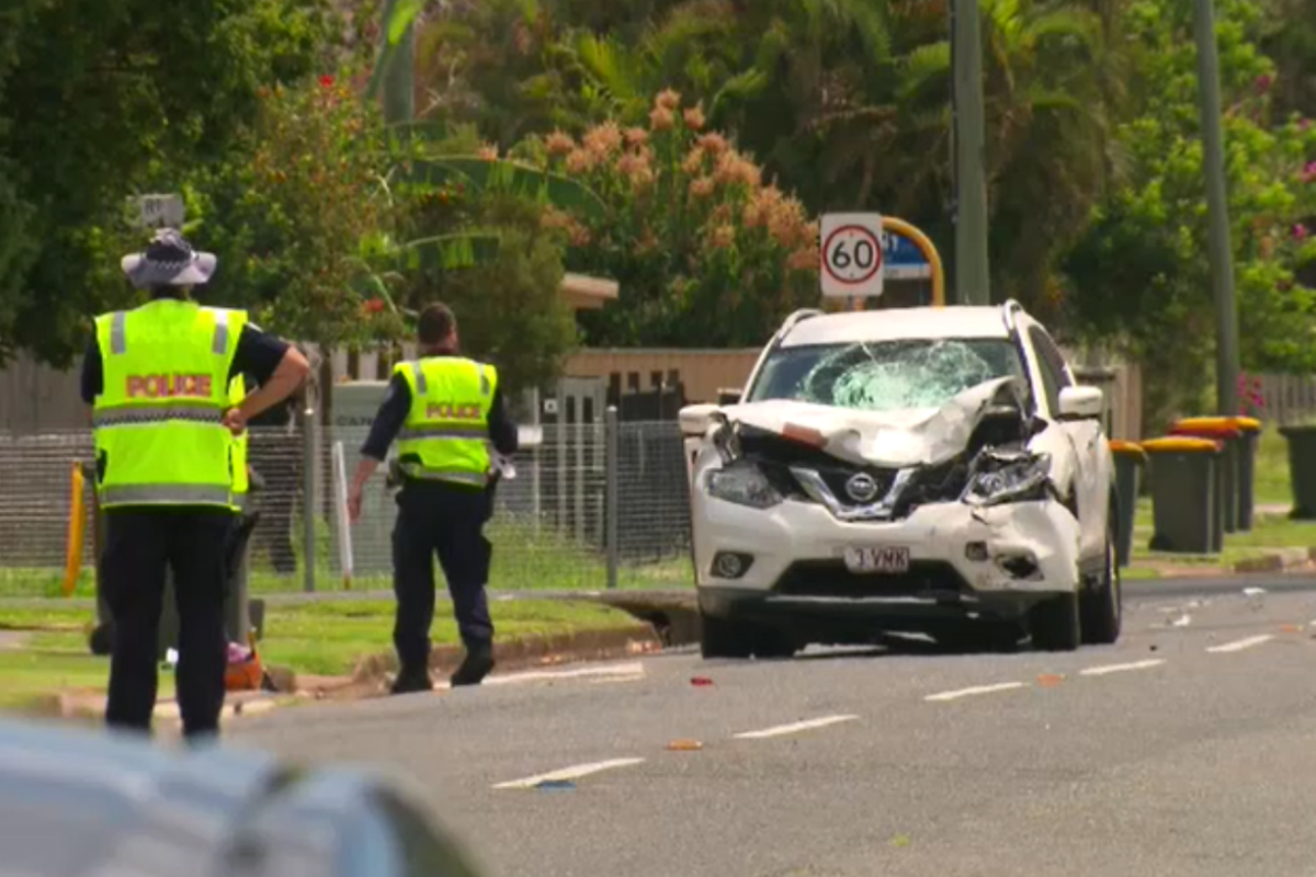 Two teens in custody after crash leaves motorcyclist fighting for life